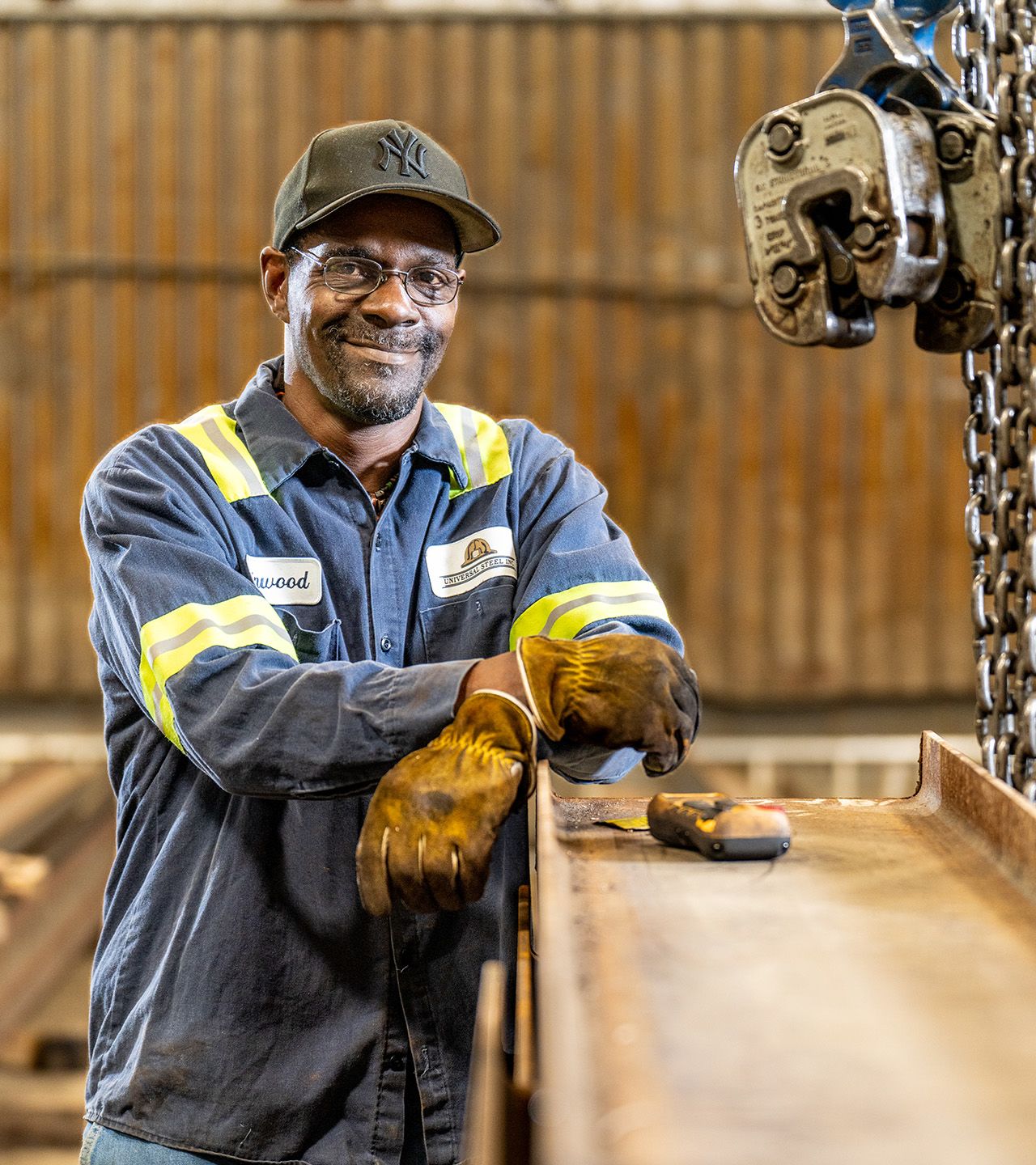 Linwood Martin, posing by a structural steel beam